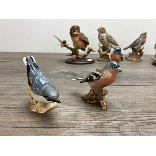 A collection of bird figurines to include Beswick, Bossons, Country ...