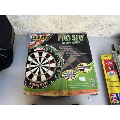 A Winmau Pro SFB entry level dartboard
