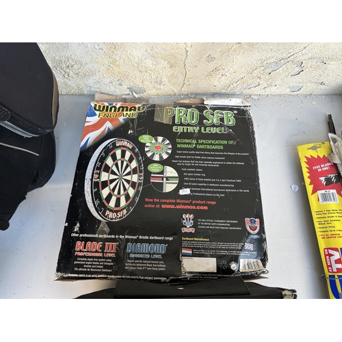 A Winmau Pro SFB entry level dartboard