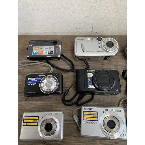 A collection of Sony Cyber-shot compact digital cameras to include DSC ...