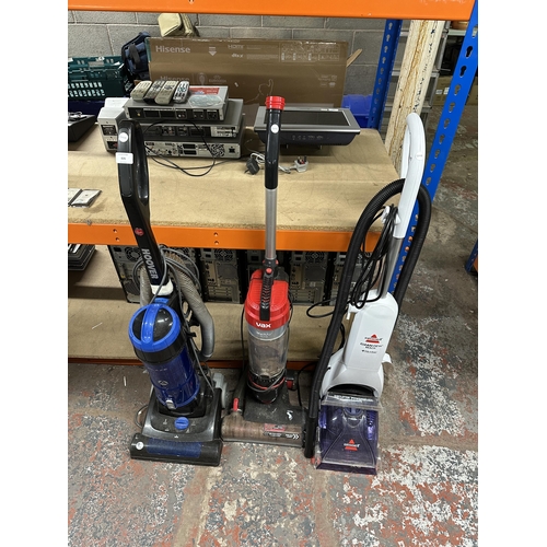 Three cleaners, one Hoover Blaze upright bagless vacuum, one Vax ...