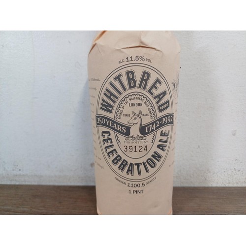 A wrapped 1 pint bottle of 1992 Whitbread Celebration ale - limited ...