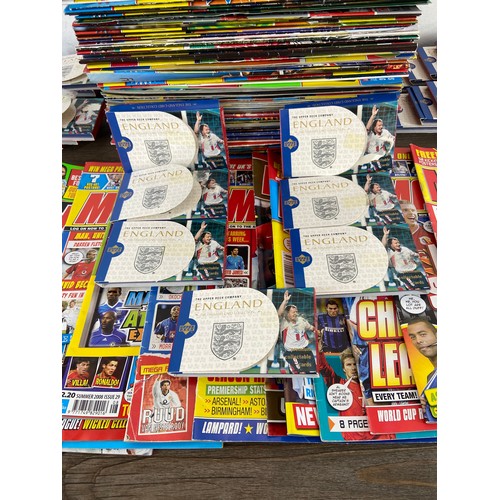 A large collection of Match football magazines together with Upper Deck ...