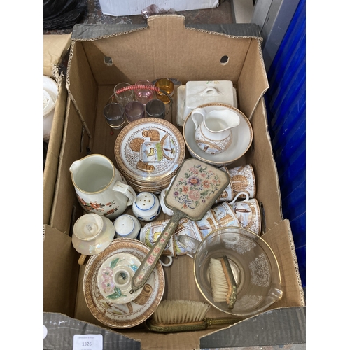 Three boxes containing Poole Pottery seal, Poole Pottery otter, brass ...