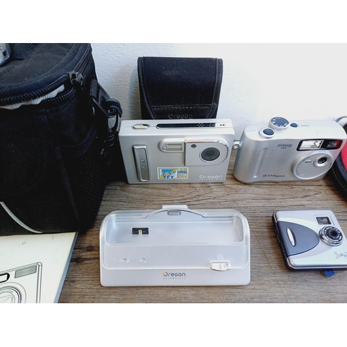 A collection of compact digital cameras to include Oregon Scientific ...