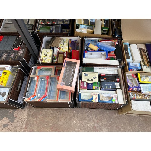 Fourteen boxes containing a large quantity of empty diecast model ...