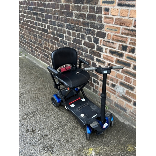 Two mobility items, one 1st Mobility automatic folding scooter with key ...