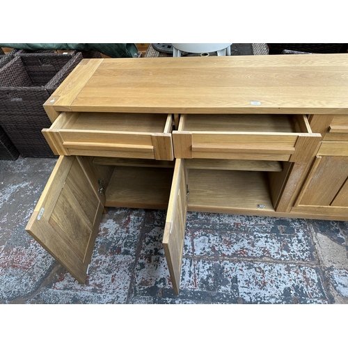 A modern oak sideboard - approx. 88cm high x 179cm wide x 50cm deep