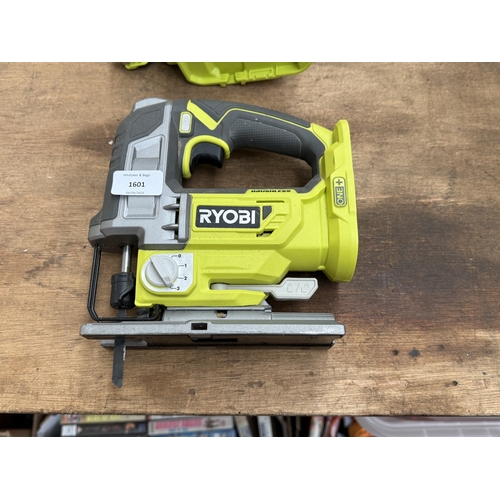 Three Ryobi cordless power tools, one jigsaw, one staple gun and one sander
