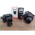 Two Canon EOS APS-C CMOS sensor DSLR cameras, one 500D 15mp fitted with ...