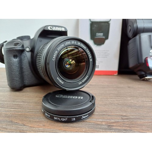 Two Canon EOS APS-C CMOS sensor DSLR cameras, one 500D 15mp fitted with ...