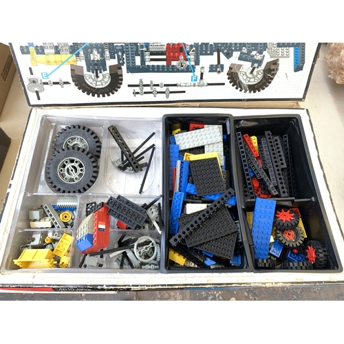 A boxed Lego 8860 Technic car chassis building set