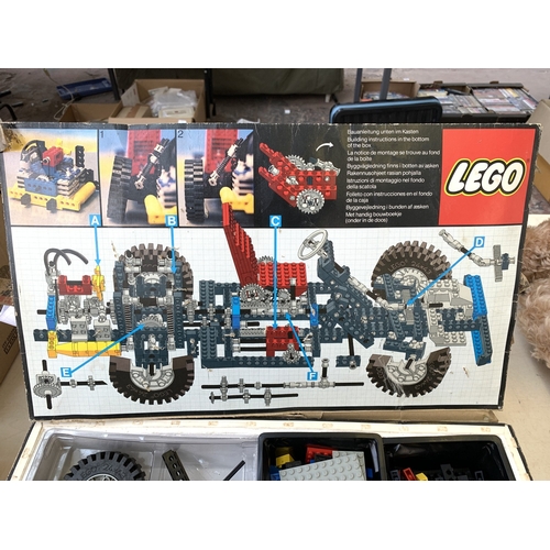A boxed Lego 8860 Technic car chassis building set