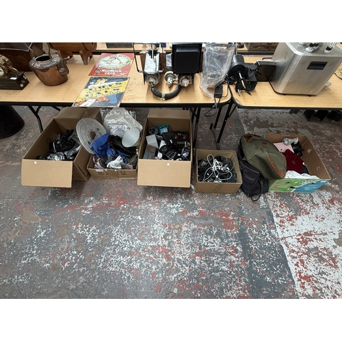 Five boxes containing satnavs, landline telephones, empty jewellery ...