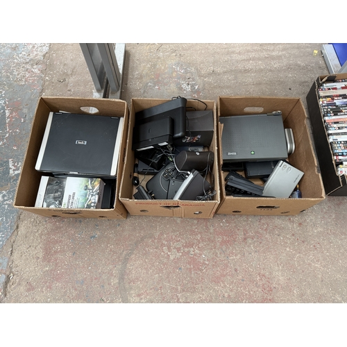 Seven boxes containing DVDs, Sanyo Dictaphone, Intempo water action ...