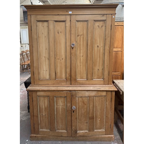 A Victorian pine housekeeper's cupboard - approx. 207cm high x 135cm ...