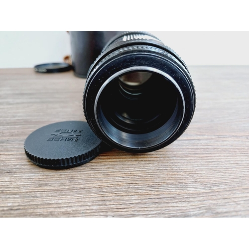 A cased KMZ Jupiter-21A 4/200 screw-mount lens with caps and KMZ UV filter