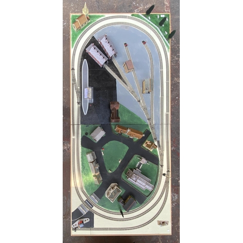 A scratch built 00 gauge model railway board layout with Peco track and ...