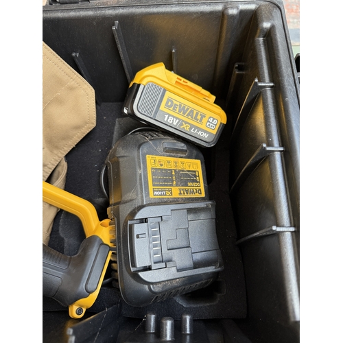 A DeWalt T Stack toolbox containing cordless DCG412 angle grinder with ...