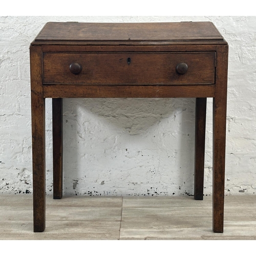 A Georgian oak writing desk - approx. 85cm high x 76cm wide x 50cm deep