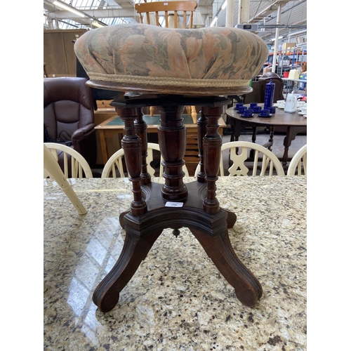 A Victorian mahogany and fabric upholstered adjustable piano stool ...