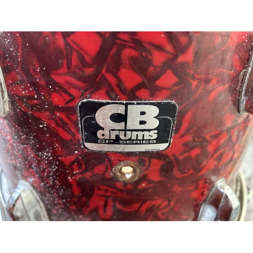 A CB Drums four piece drum kit comprising 22" bass drum, 16" floor tom ...