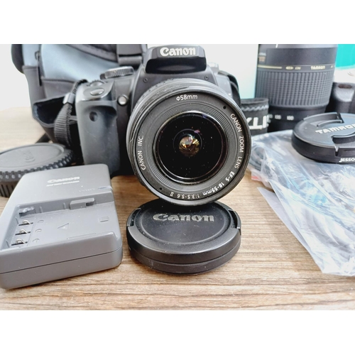 Three bagged cameras, one Canon EOS 400D 10.1mp DSLR fitted with EF-S 1 ...