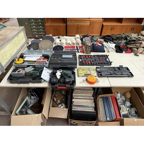 A collection of tools to include Workzone hammer drill bit set ...