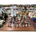 Twenty five ceramic and resin animal figurines and ornaments to include ...