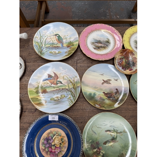 Ten hand painted ceramic plates and dishes to include Wedgwood plate ...