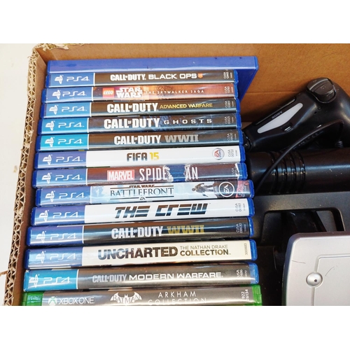 A box containing mixed console game discs to include PS4, Xbox One, Wii ...