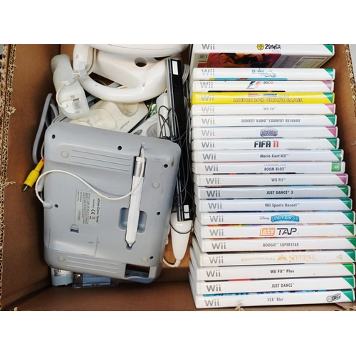 Two boxes containing Nintendo Wii items to include four consoles ...