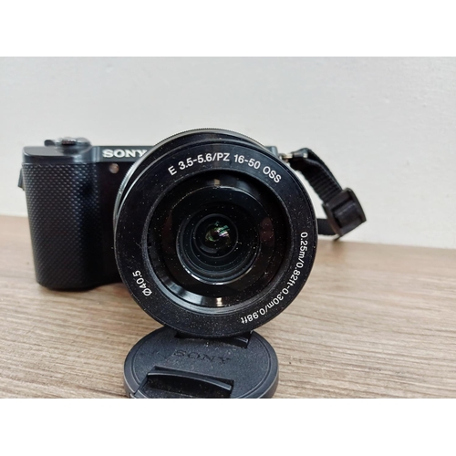 A Sony Alpha α5000 20.1mp APS-C CMOS sensor E-mount compact mirrorless ...