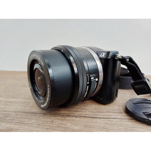 A Sony Alpha α5000 20.1mp APS-C CMOS sensor E-mount compact mirrorless ...