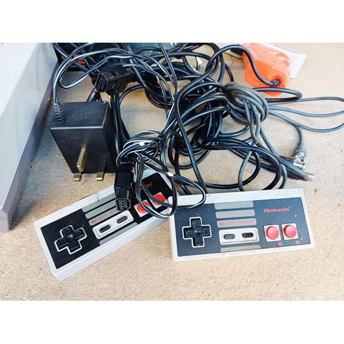 A boxed Nintendo Entertainment System action set comprising console ...