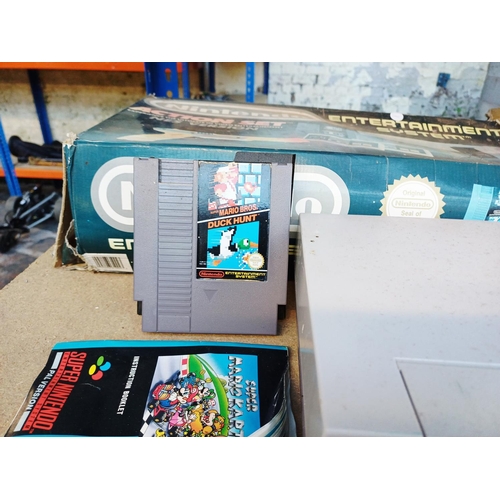 A boxed Nintendo Entertainment System action set comprising console ...