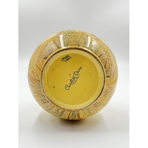 An Art Deco Carlton Ware hand painted vase depicting duck in flight ...