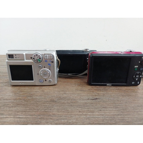 Three Nikon Coolpix CCD sensor compact digital cameras, one L28 20.1mp ...