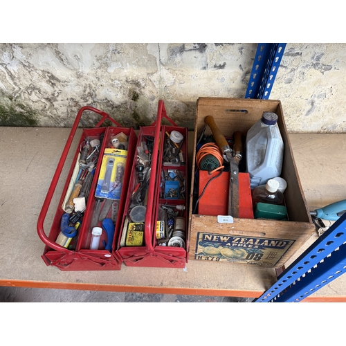 Three items, two red metal concertina tool boxes and one box containing ...