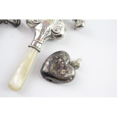 Four sterling silver baby rattles - approx. gross weight 89g