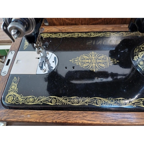 A cased 1930 Singer 99K converted electric sewing machine fitted with B ...