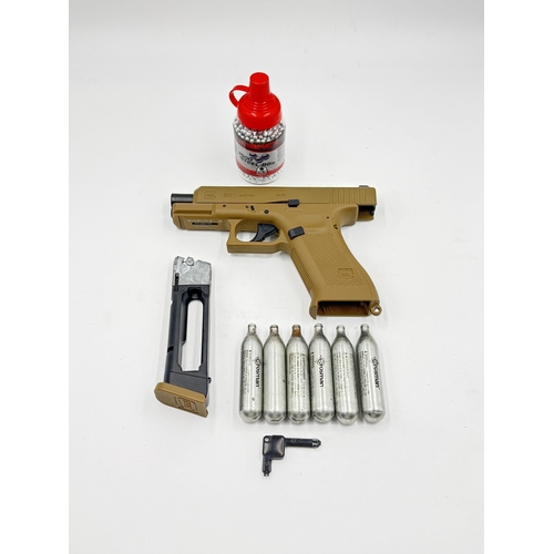 An Umarex Glock 19X ACWX519 4.5mm gas powered BB gun with gas ...