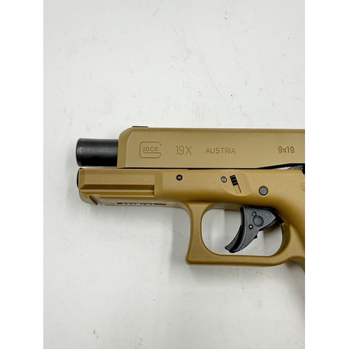 An Umarex Glock 19X ACWX519 4.5mm gas powered BB gun with gas ...
