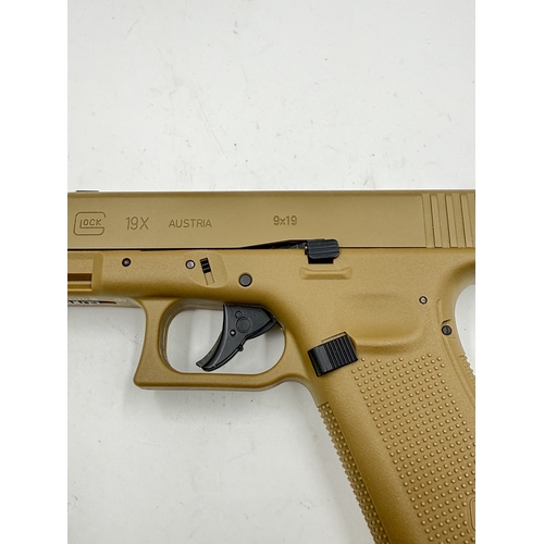 An Umarex Glock 19X ACWX519 4.5mm gas powered BB gun with gas ...