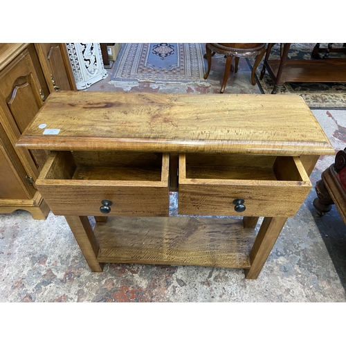 A mango wood console table - approx. 81cm high x 80cm wide x 25cm deep