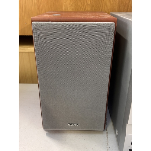 A Sony CMT-SPZ90DB micro stereo system comprising three disc changer CD ...