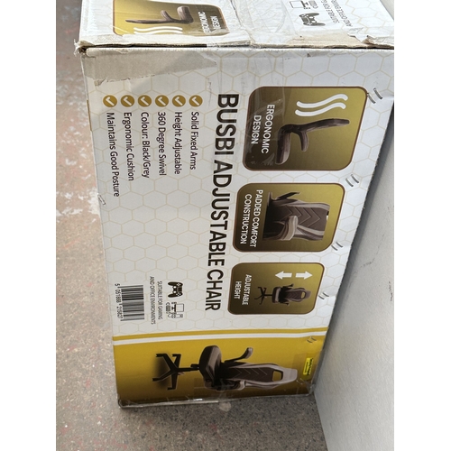A boxed Busbi adjustable gaming/office chair