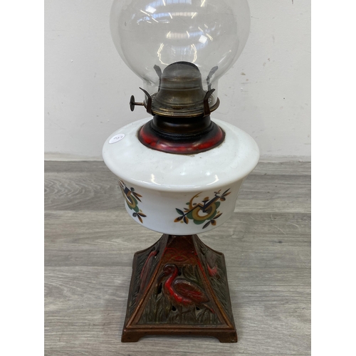 A late 19th/early 20th century English made hand painted cast metal oil ...