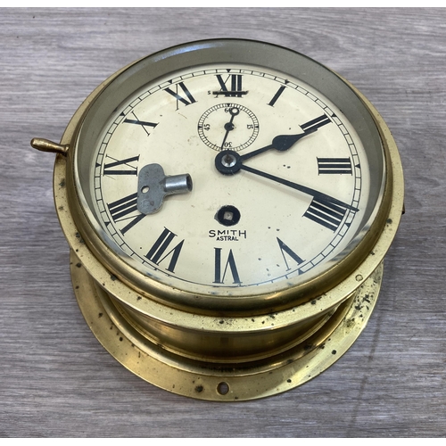 A Smith Astral brass cased key wind ship's wall clock with key - approx ...