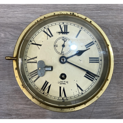 A Smith Astral brass cased key wind ship's wall clock with key - approx ...